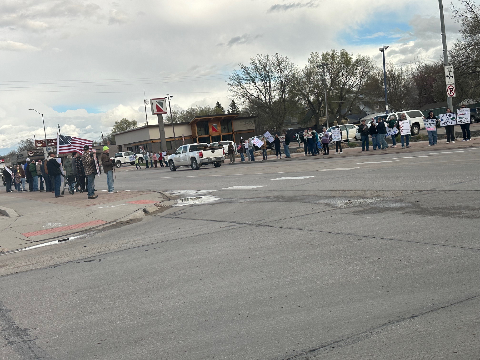Protesters Outside Chadron Grocery Store – KCSR / KBPY